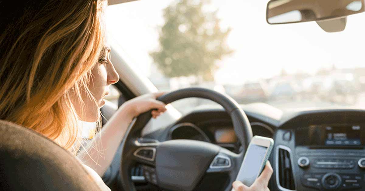 Iowa's Distracted Driving Laws: Your Guide | InsuredBetter